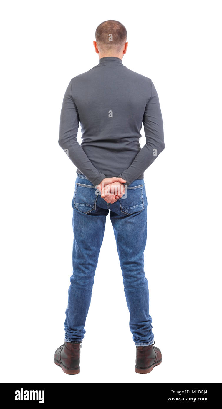 Back view of man in jeans. Standing young guy. Rear view people ...