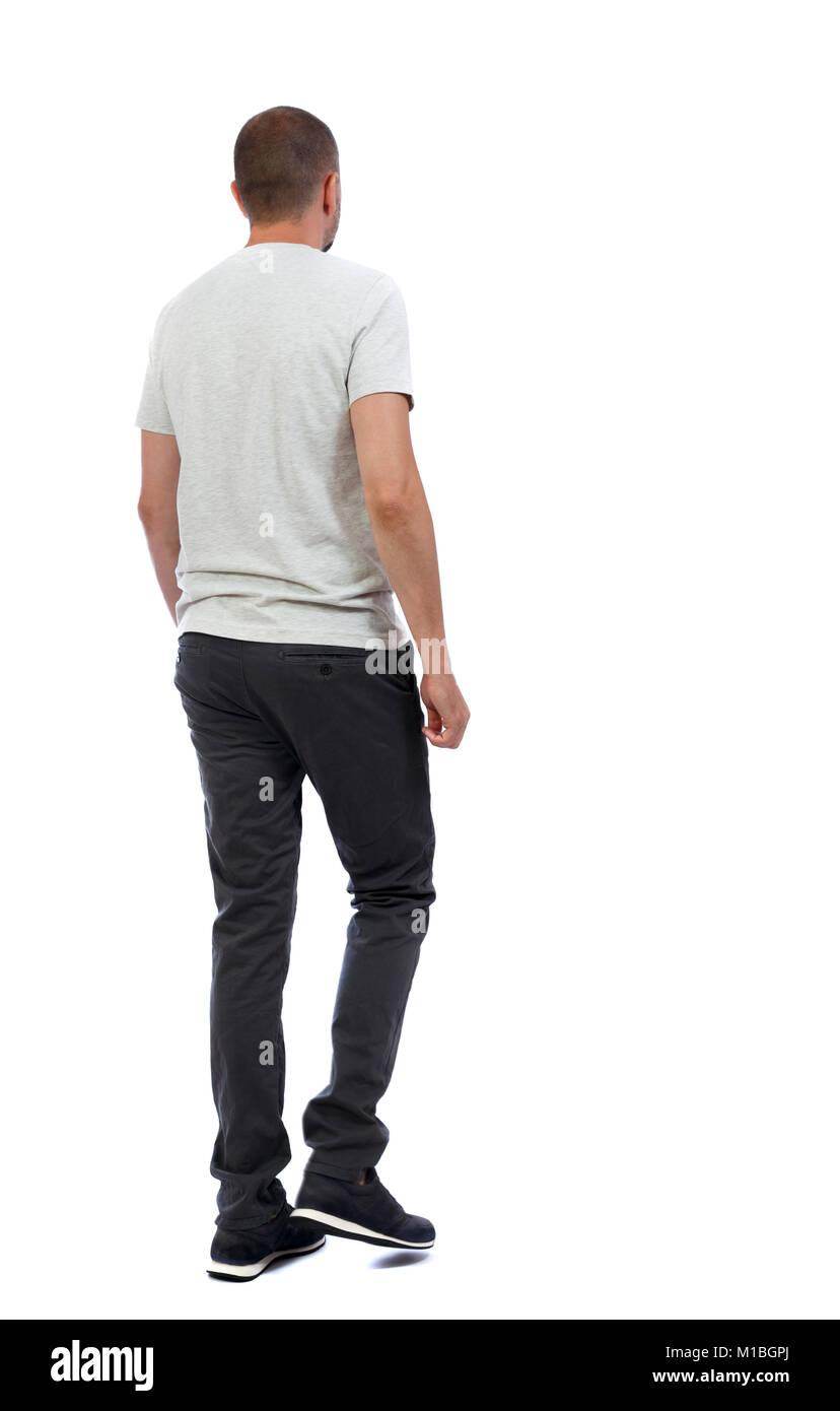 Back view of going handsome man. walking young guy . Rear view people ...