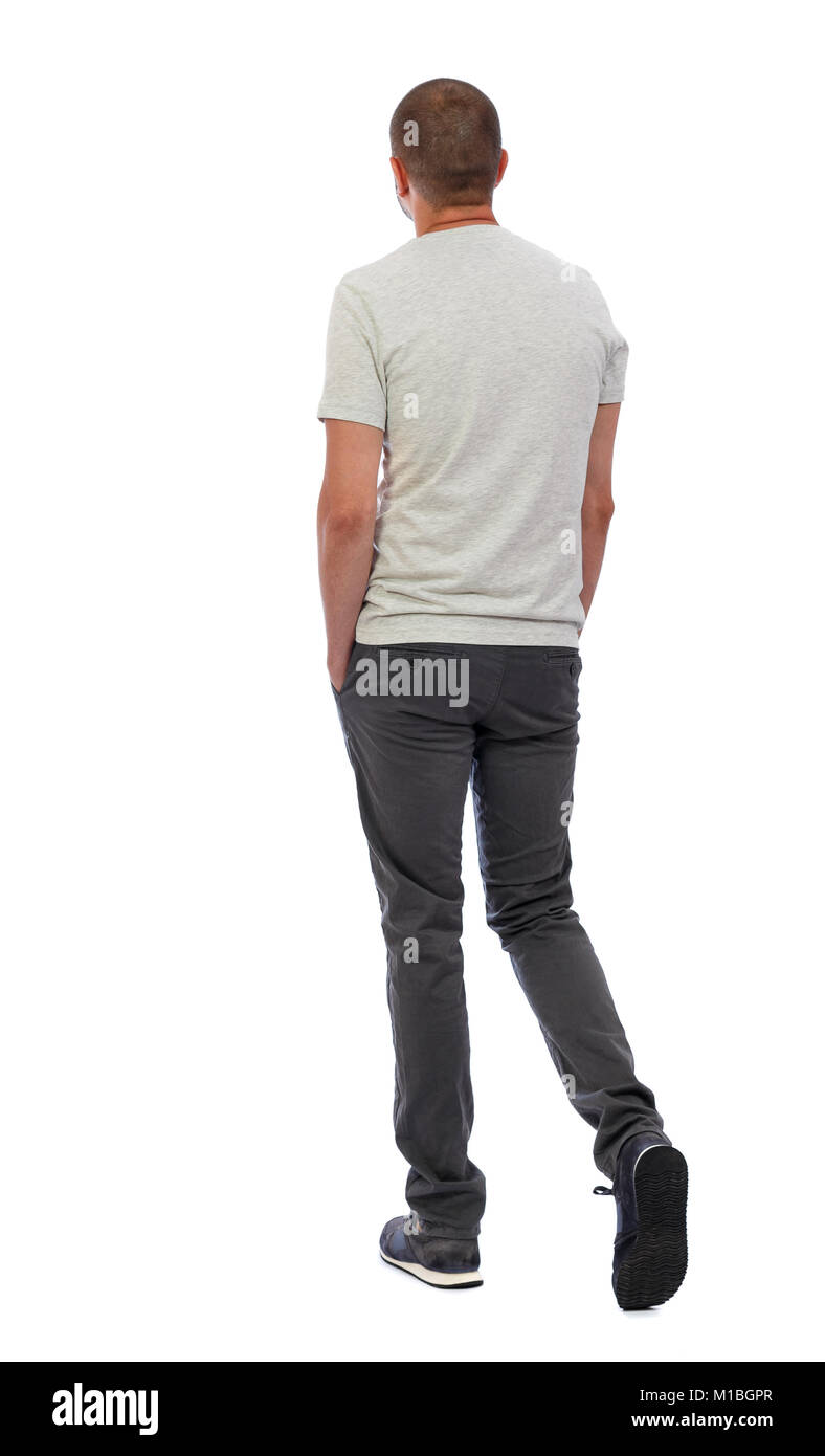 Back view of going handsome man. walking young guy . Rear view people ...