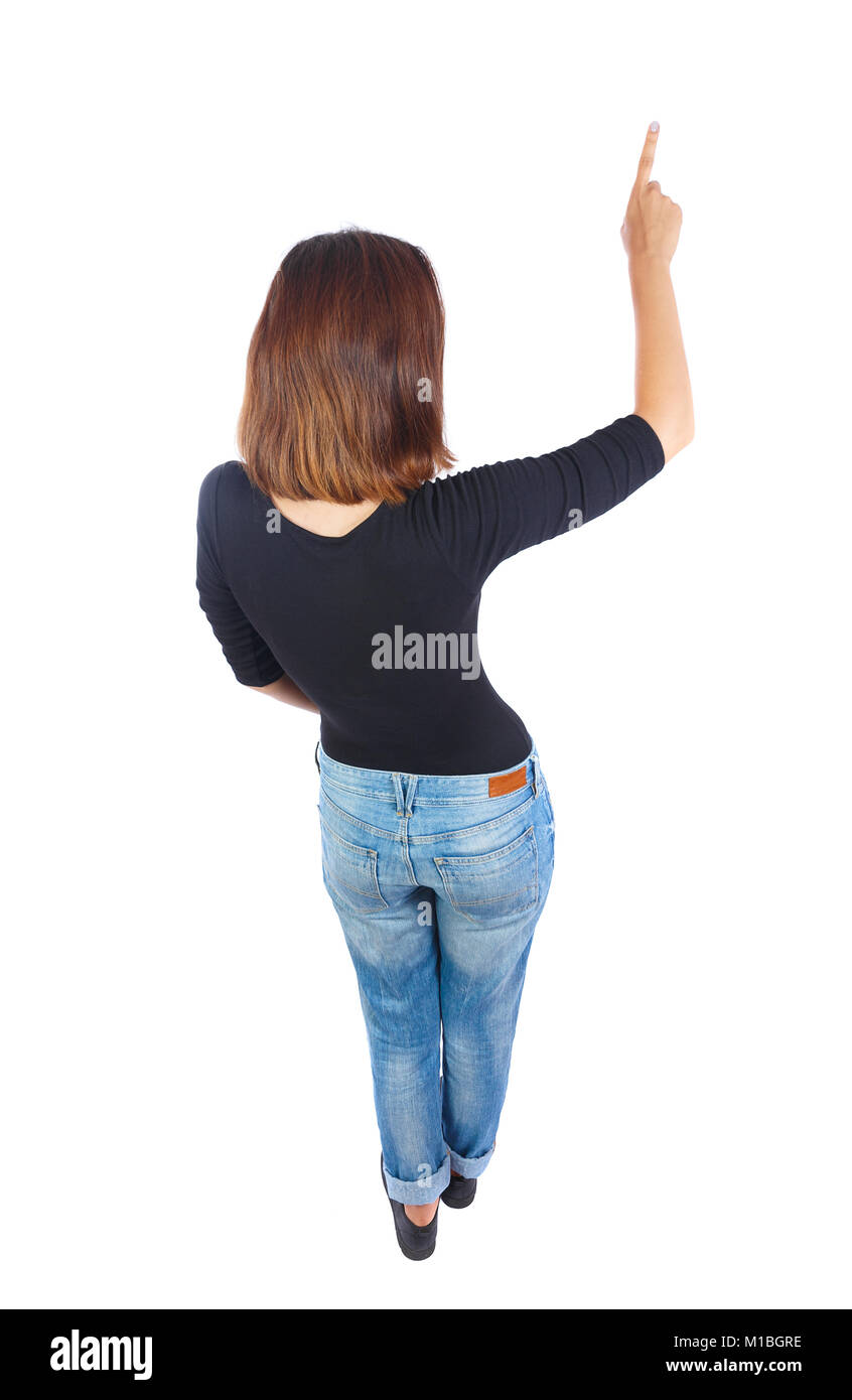 Back view of pointing woman. beautiful girl. Rear view people ...