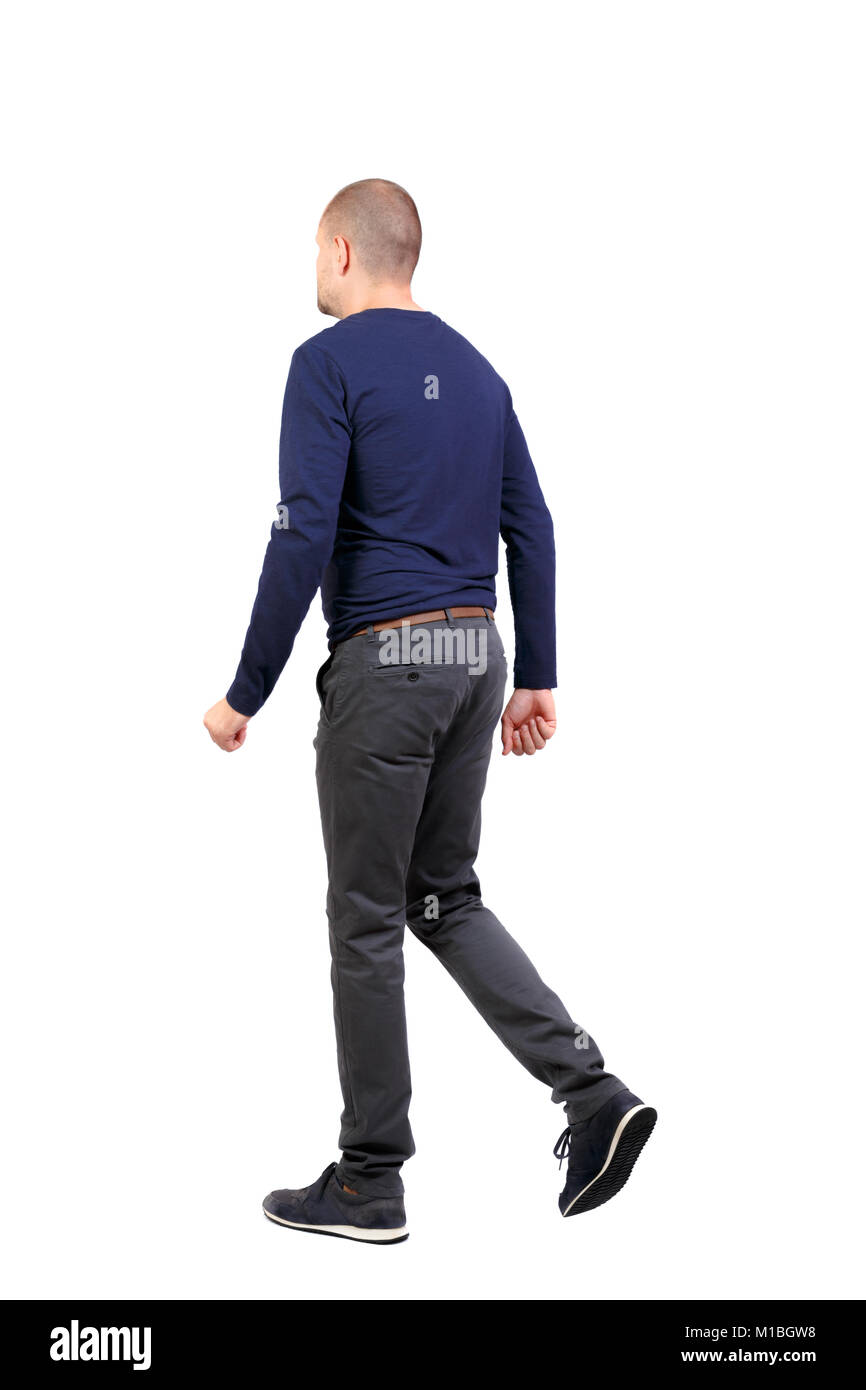 Back view of going handsome man. walking young guy . Rear view people ...