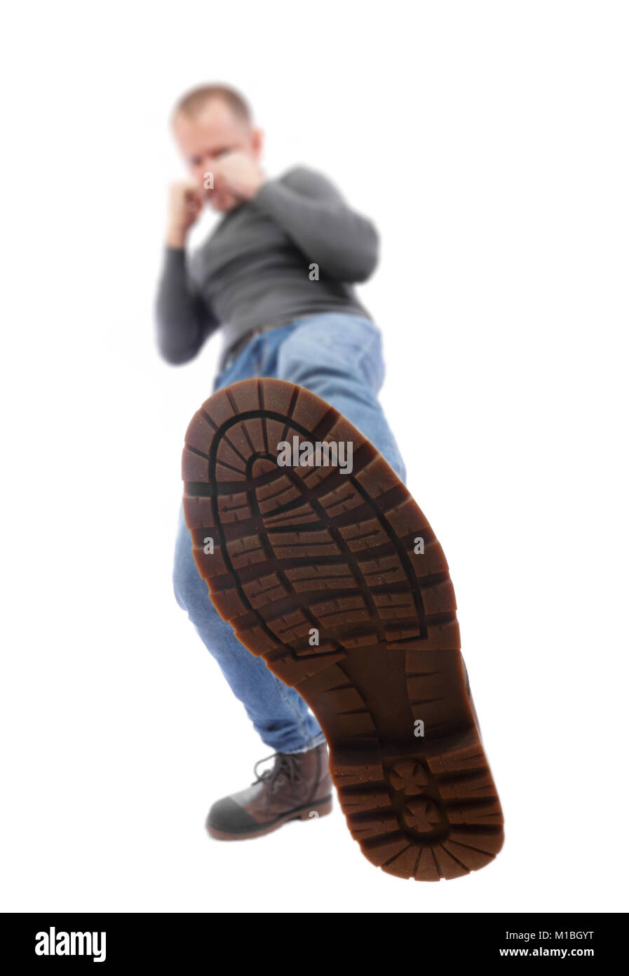 The Man Is Kicking Foot With A Shoe Close Up A Man In A Battle Rack Strikes His Foot Stock