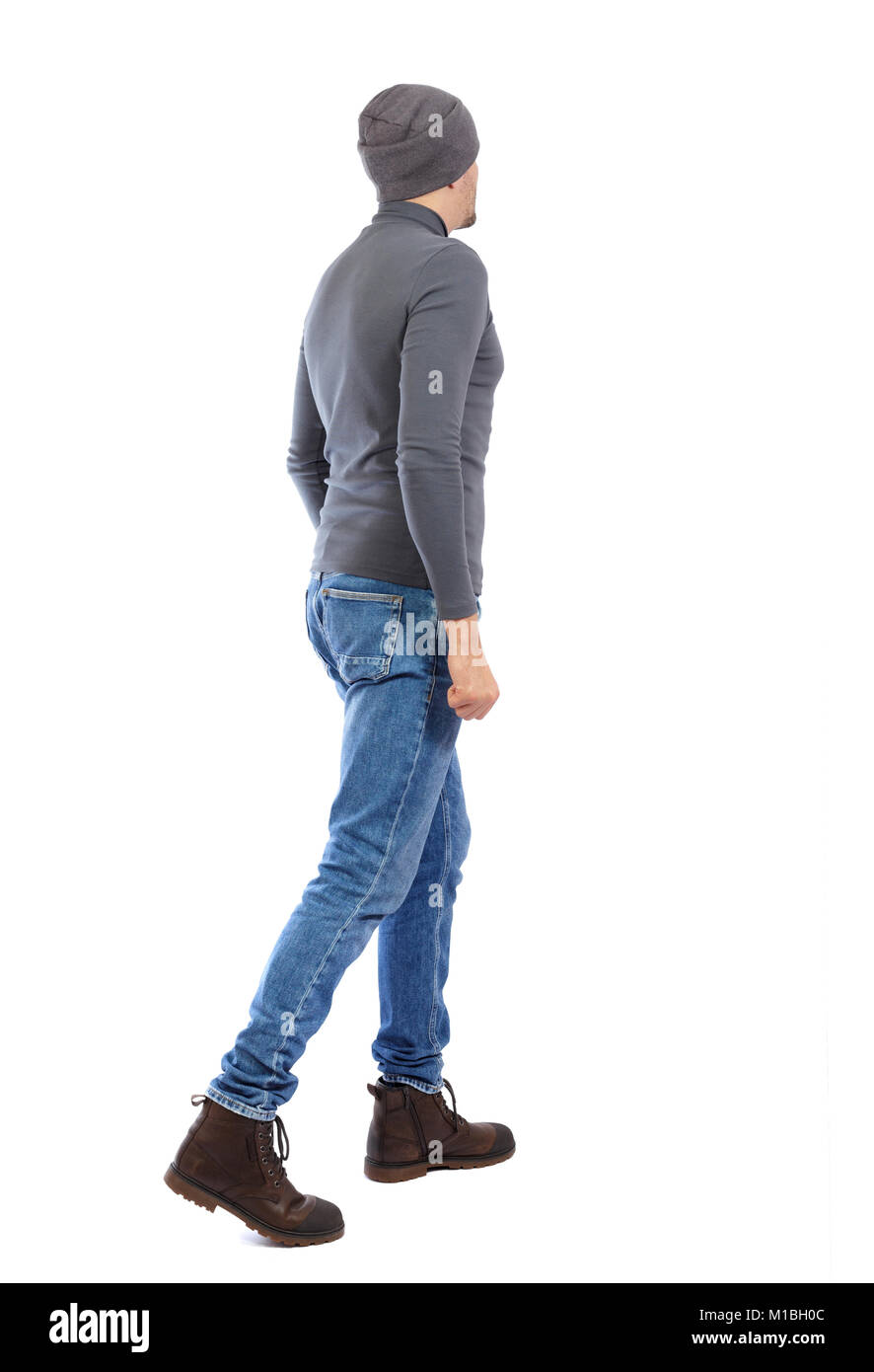 Back view of going handsome man. walking young guy . Rear view people ...