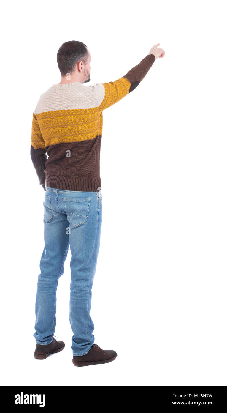 Back view of pointing young men in shirt and jeans Stock Photo - Alamy