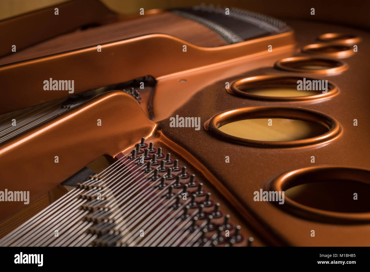 Strings inside black piano hi-res stock photography and images - Alamy
