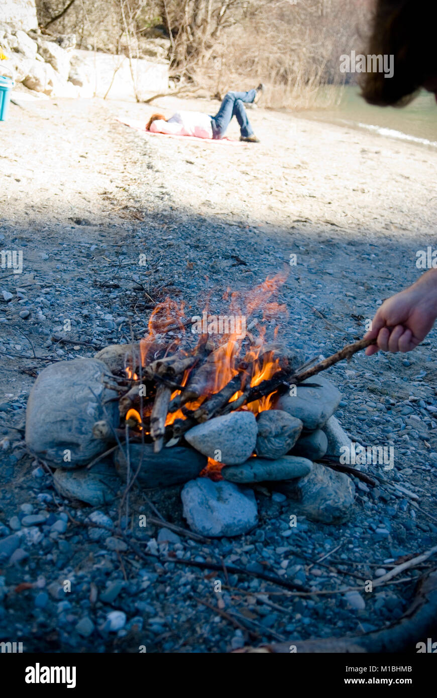 Beside camp fire hi-res stock photography and images - Alamy