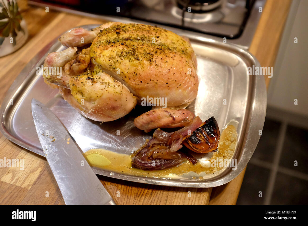 Home cooked roast chicken for Sunday lunch ready for carving Stock ...