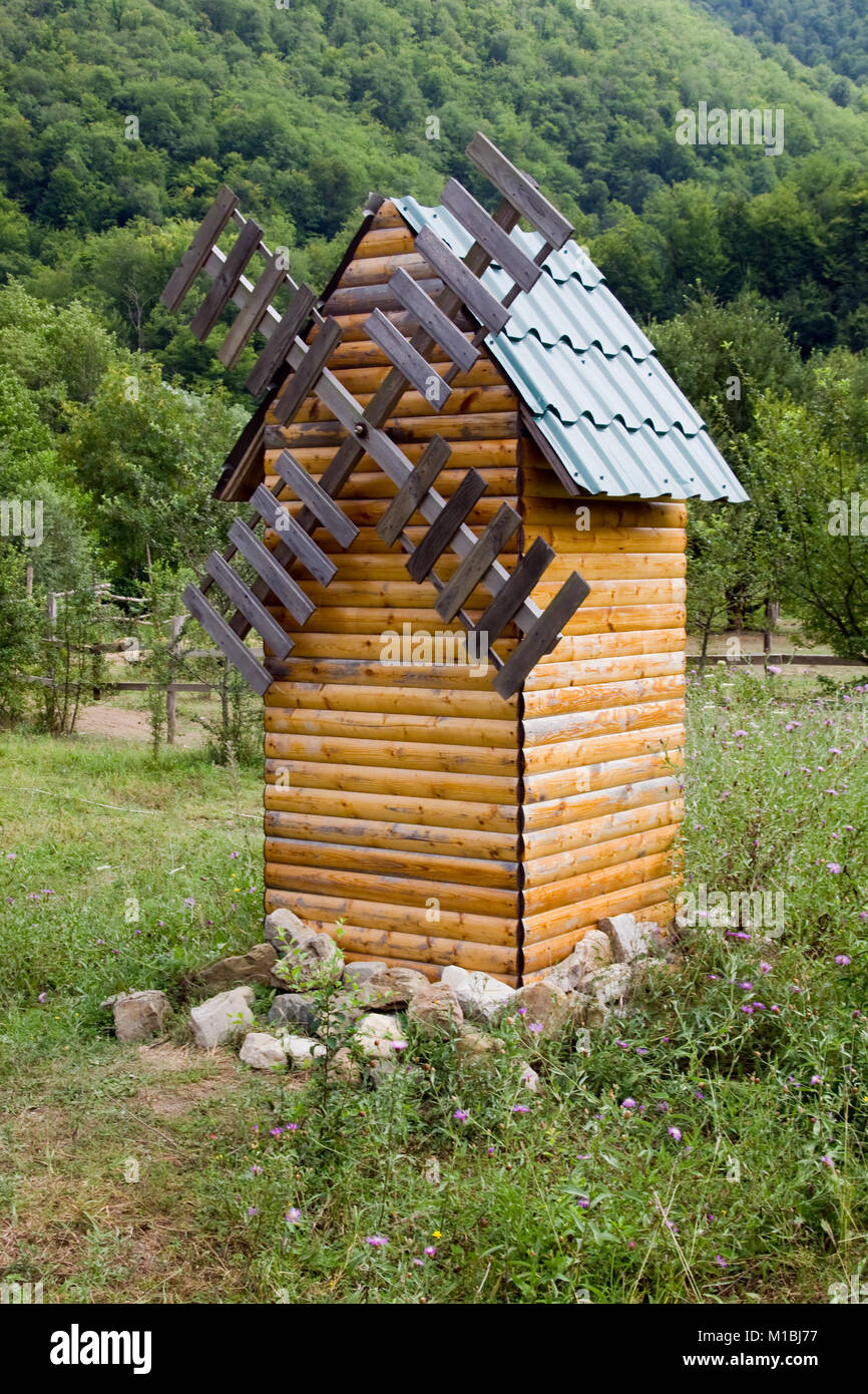 Decorative small wooden windmill Stock Photo - Alamy