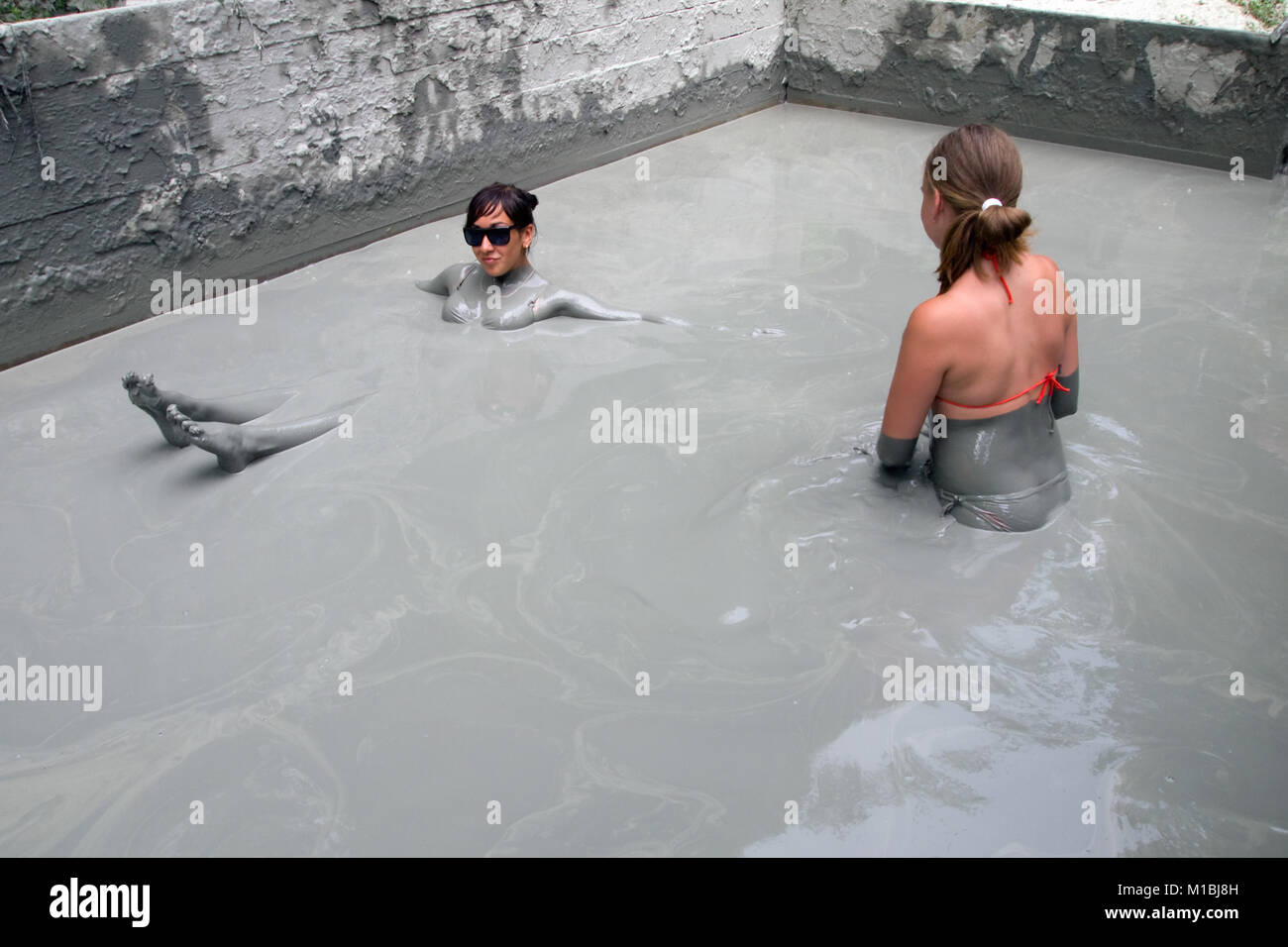 Lermontovo, Russia - August 8, 2012: People take a mud bath with blue ...