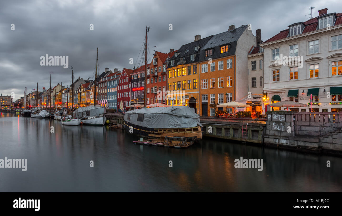COPENHAGEN, DENMARK - FEBRUARY 28, 2017: Nyhavn at night. A 17th ...