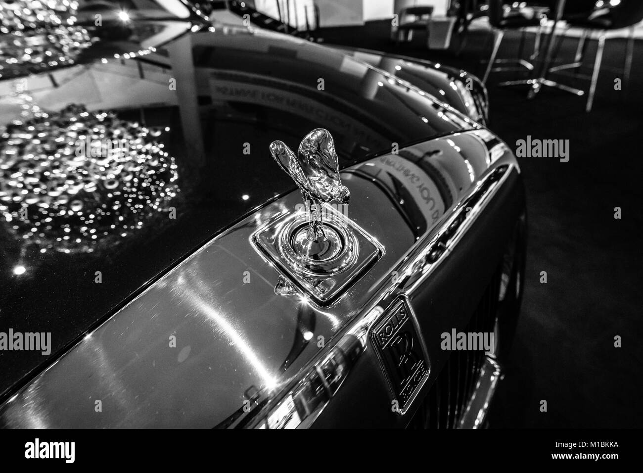 Showroom. The emblem "Spirit of Ecstasy" of a full-size luxury car ...