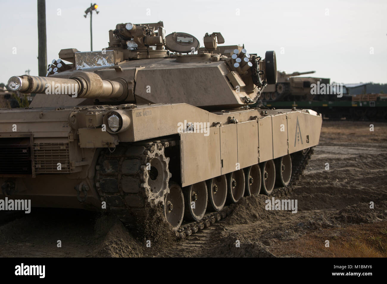 U.S. Marines with 2nd Tank Battalion, 2nd Marine Division load M1A1 ...