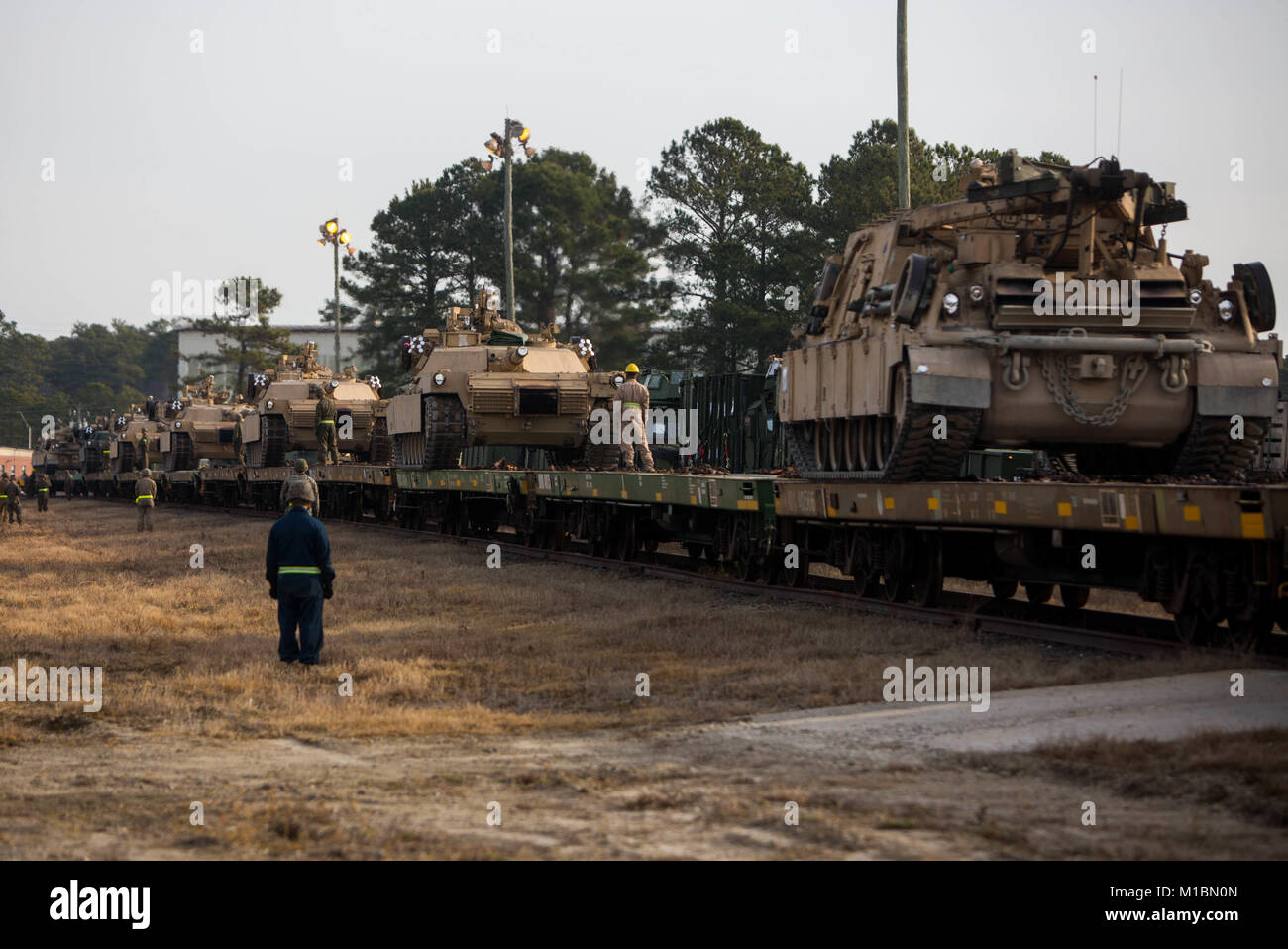 U.S. Marines with 2nd Tank Battalion, 2nd Marine Division load M1A1 ...
