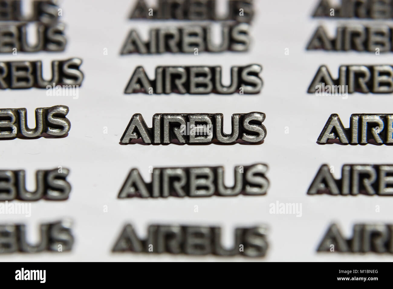 BERLIN - NOVEMBER 20, 2017: Background of small lapel pins AIRBUS Stock ...