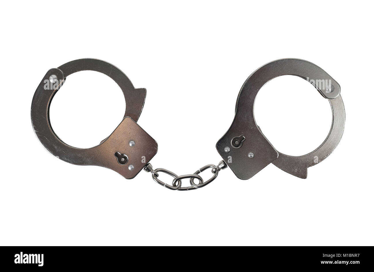 Metal handcuffs isolated on white background Stock Photo - Alamy