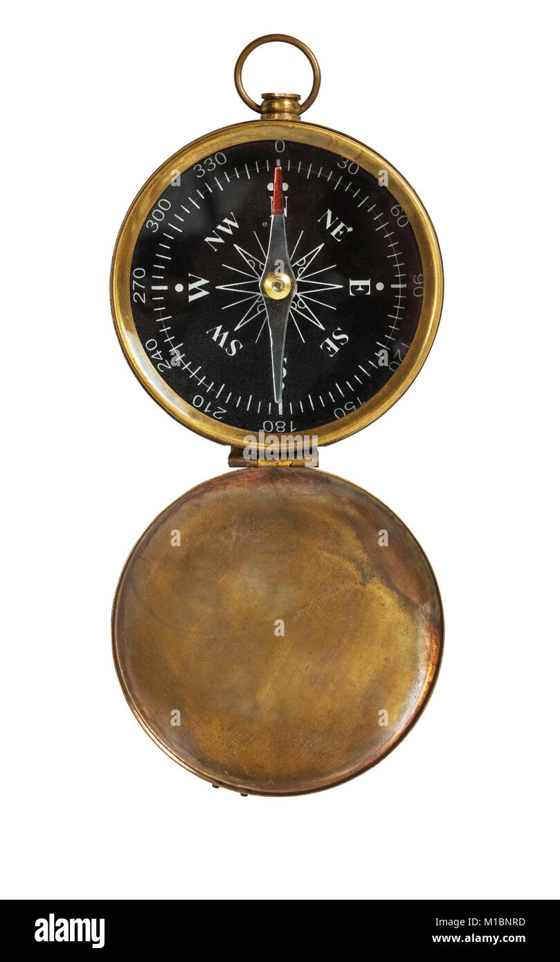 Old golden compass on white background showing north Stock Photo - Alamy