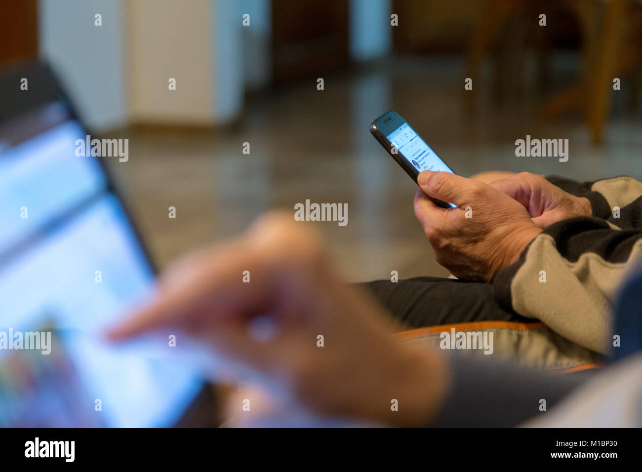 Seniors using technology Stock Photo - Alamy