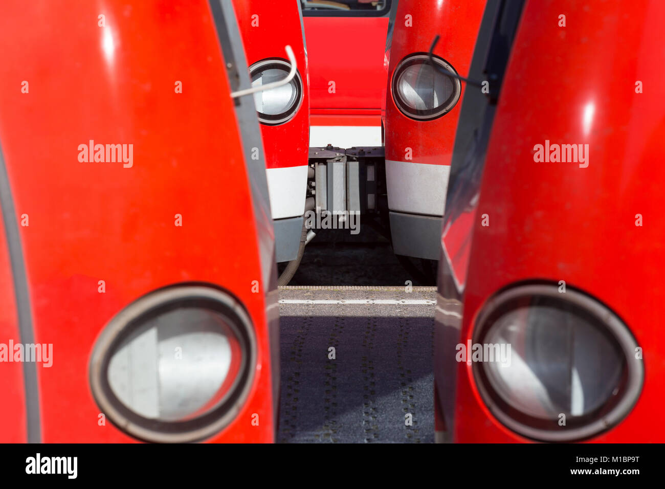 red passenger trains close up background Stock Photo - Alamy