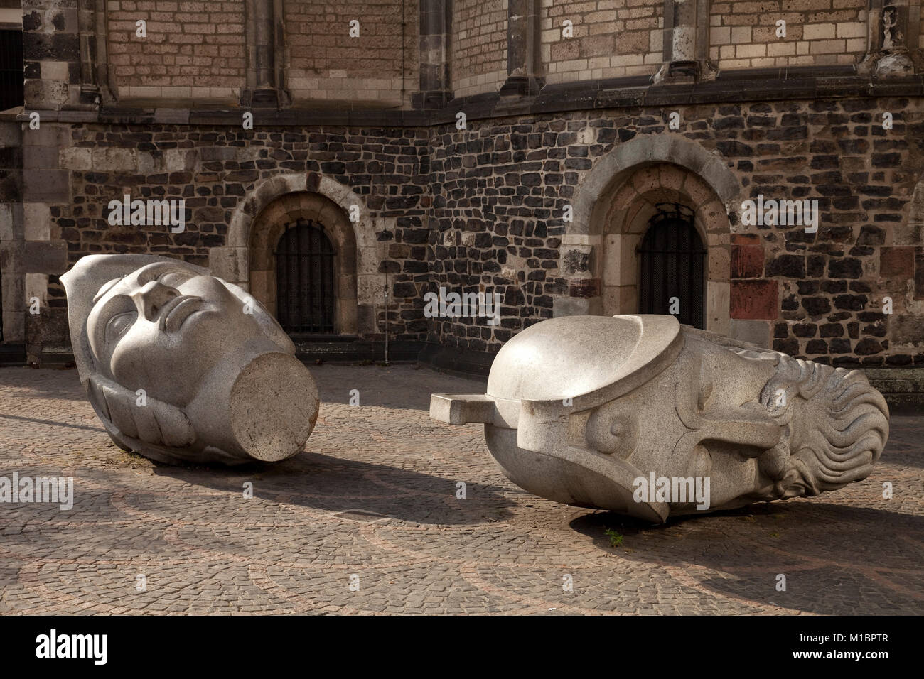 Granite heads, stone sculpture Florentius and Cassius, in front of Bonn ...