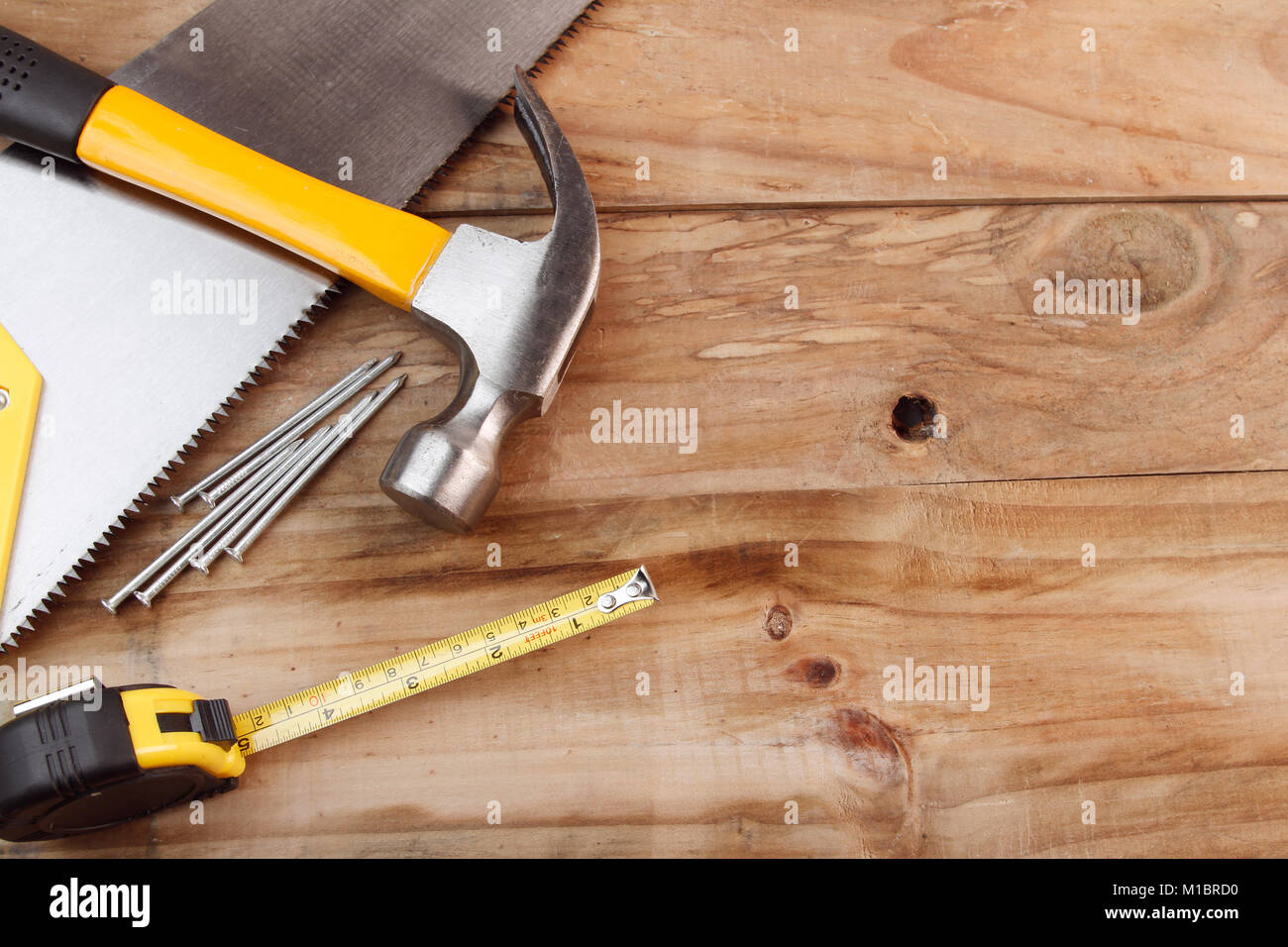 Assortment of tools on wood Stock Photo - Alamy