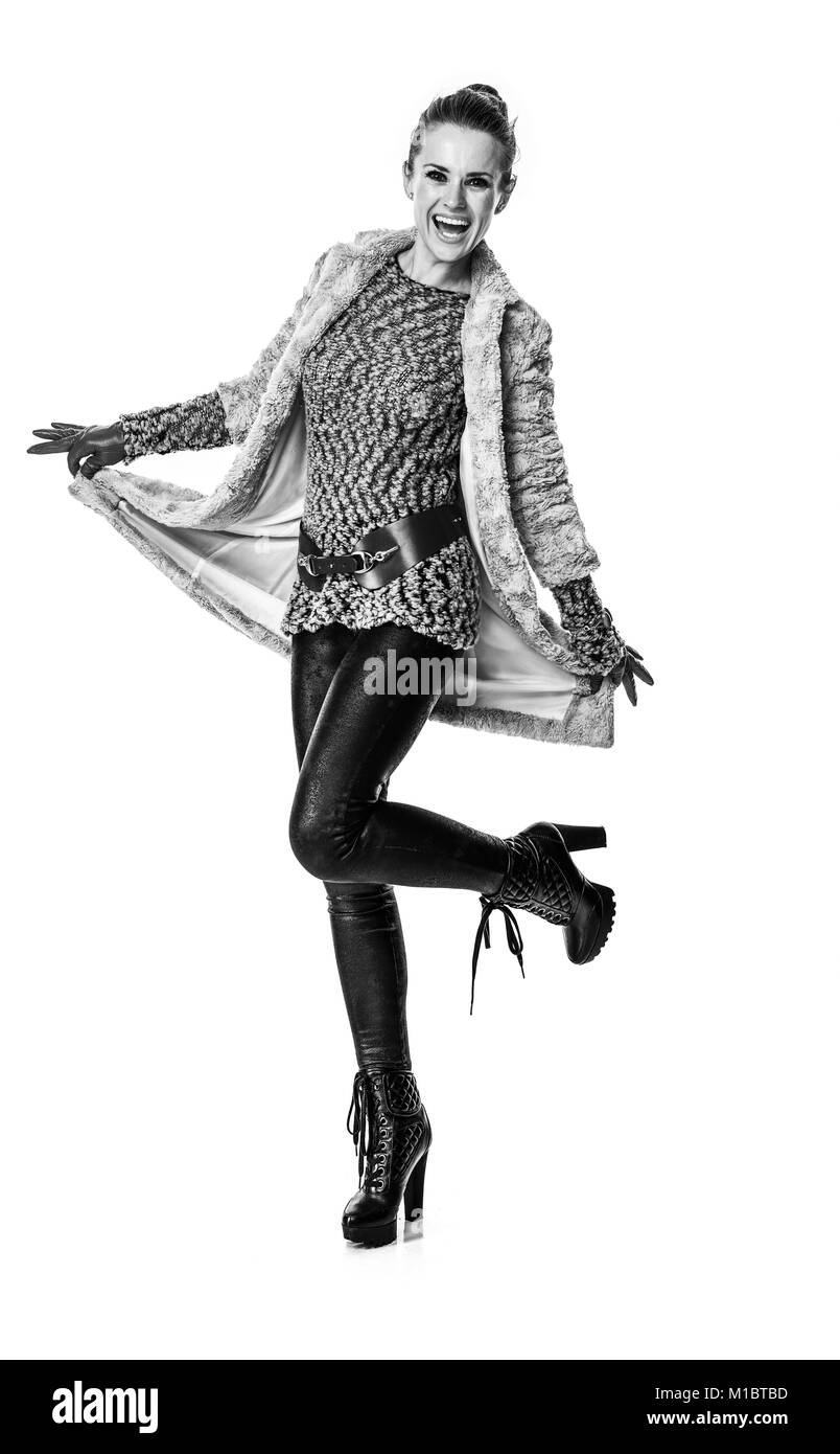 Winter things. Full length portrait of cheerful stylish woman in winter ...