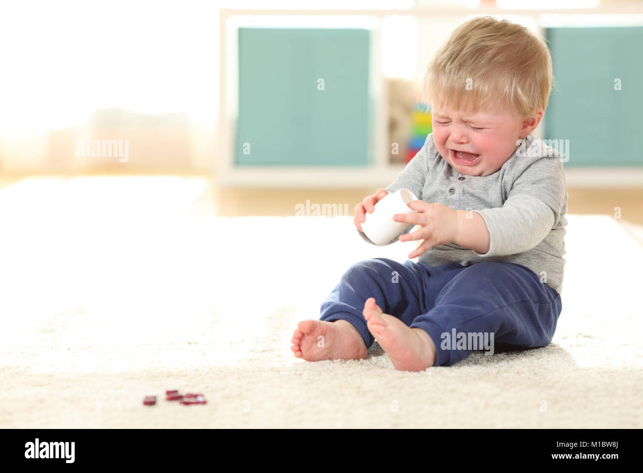Sad baby hi-res stock photography and images - Alamy