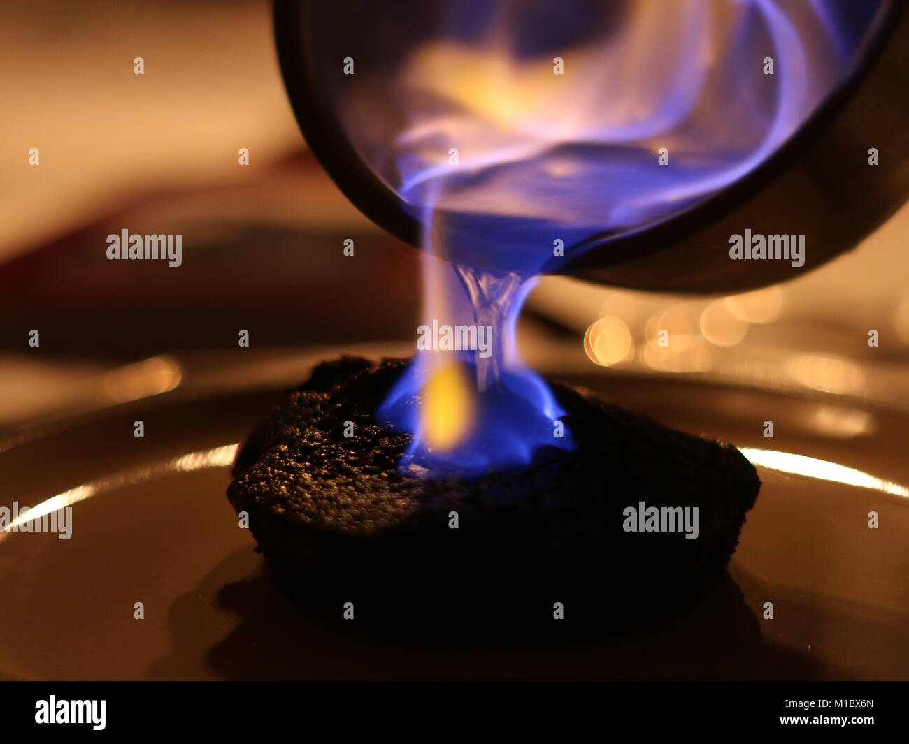 A chocolate lava cake flambe served at Torridon House in the Scottish ...