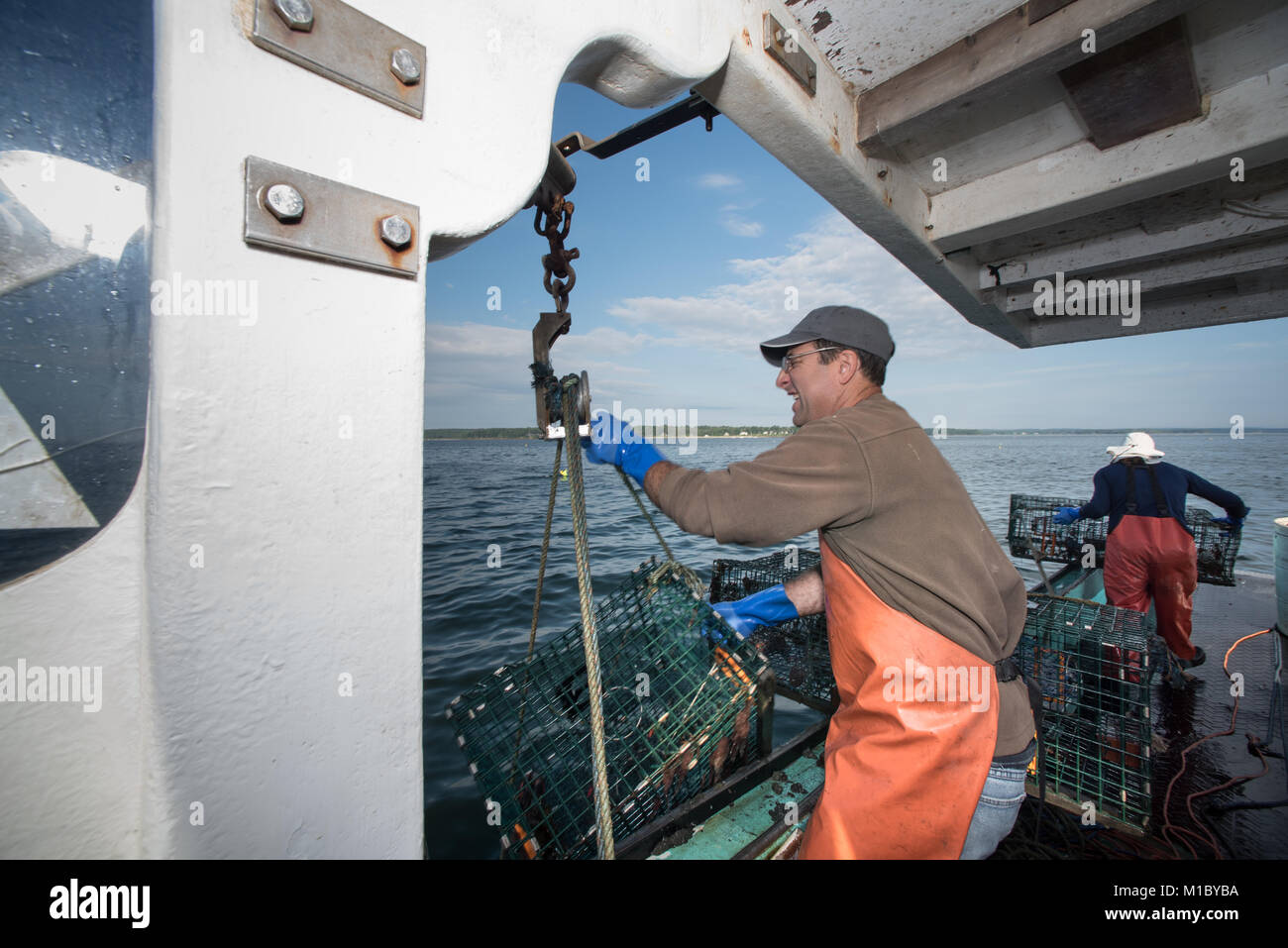 Lobstermen hauling traps. Chebeague Island, Casco Bay, Maine Stock ...