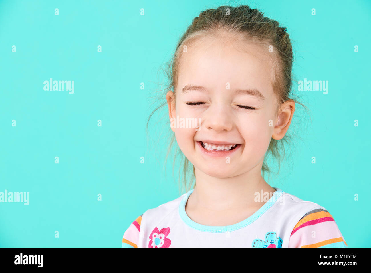 Adorable little girl with attitude. Cheeky preschooler headshot ...