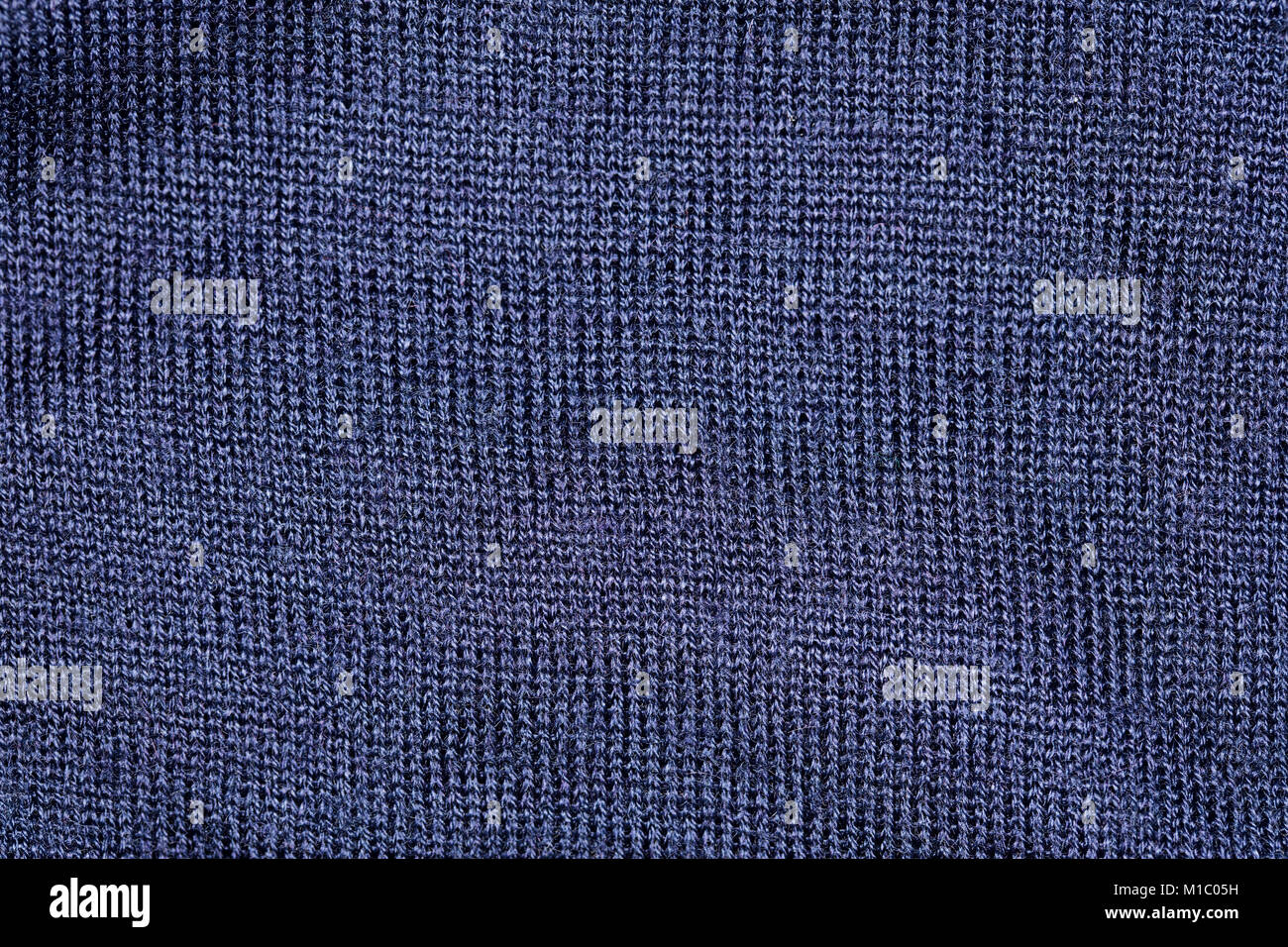fabric in blue color, closeup on stitch Stock Photo - Alamy