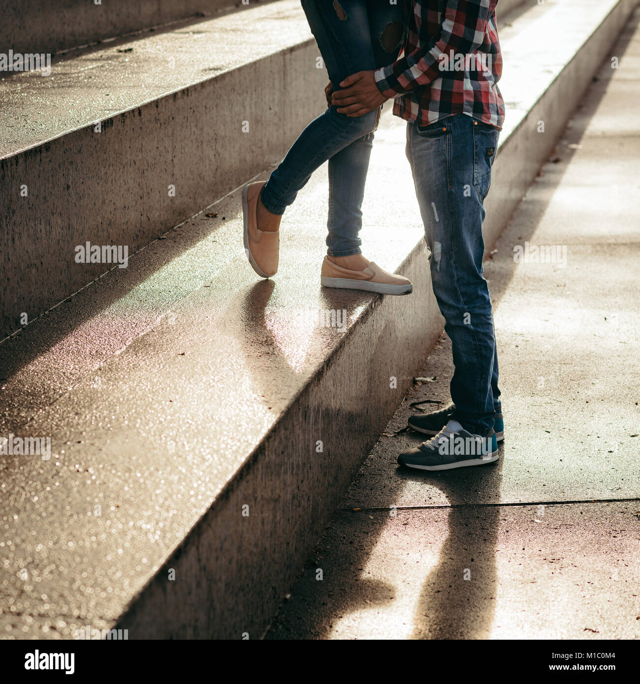 Couple touching legs hi-res stock photography and images - Alamy