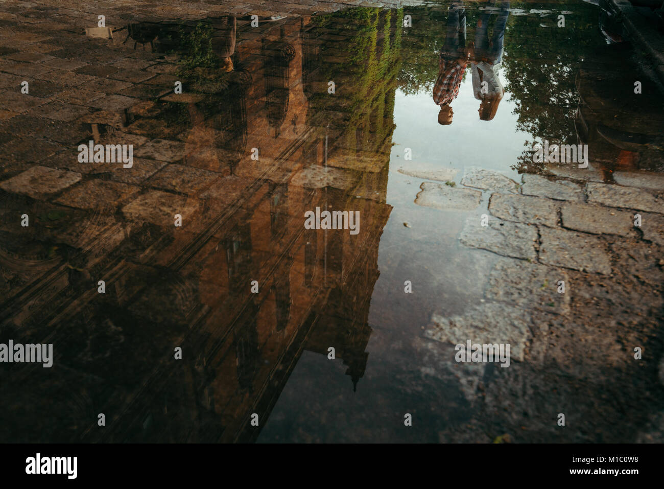 Couple water puddle reflection hi-res stock photography and images - Alamy