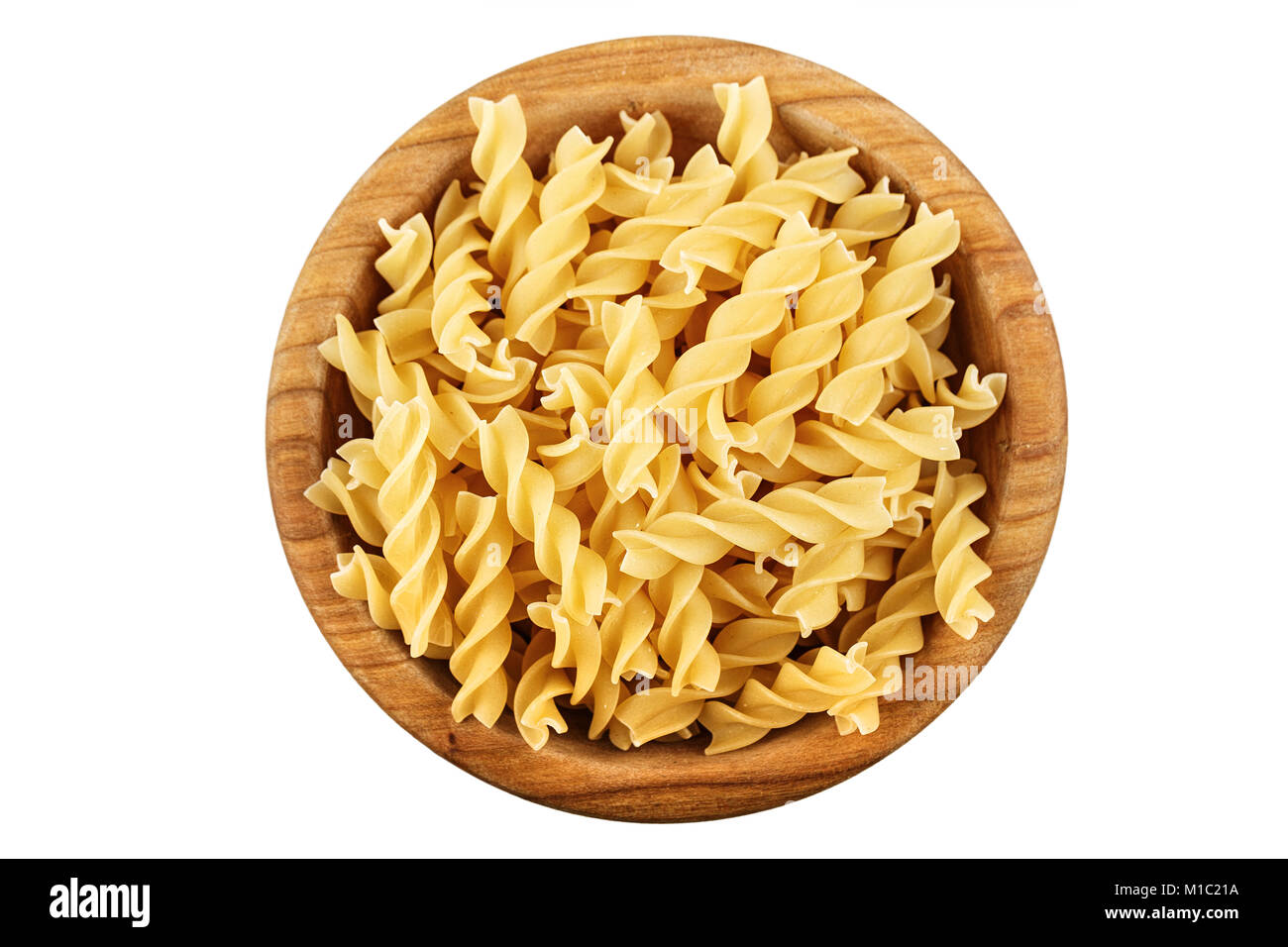 raw pasta in a plate isolated on a white background Stock Photo - Alamy