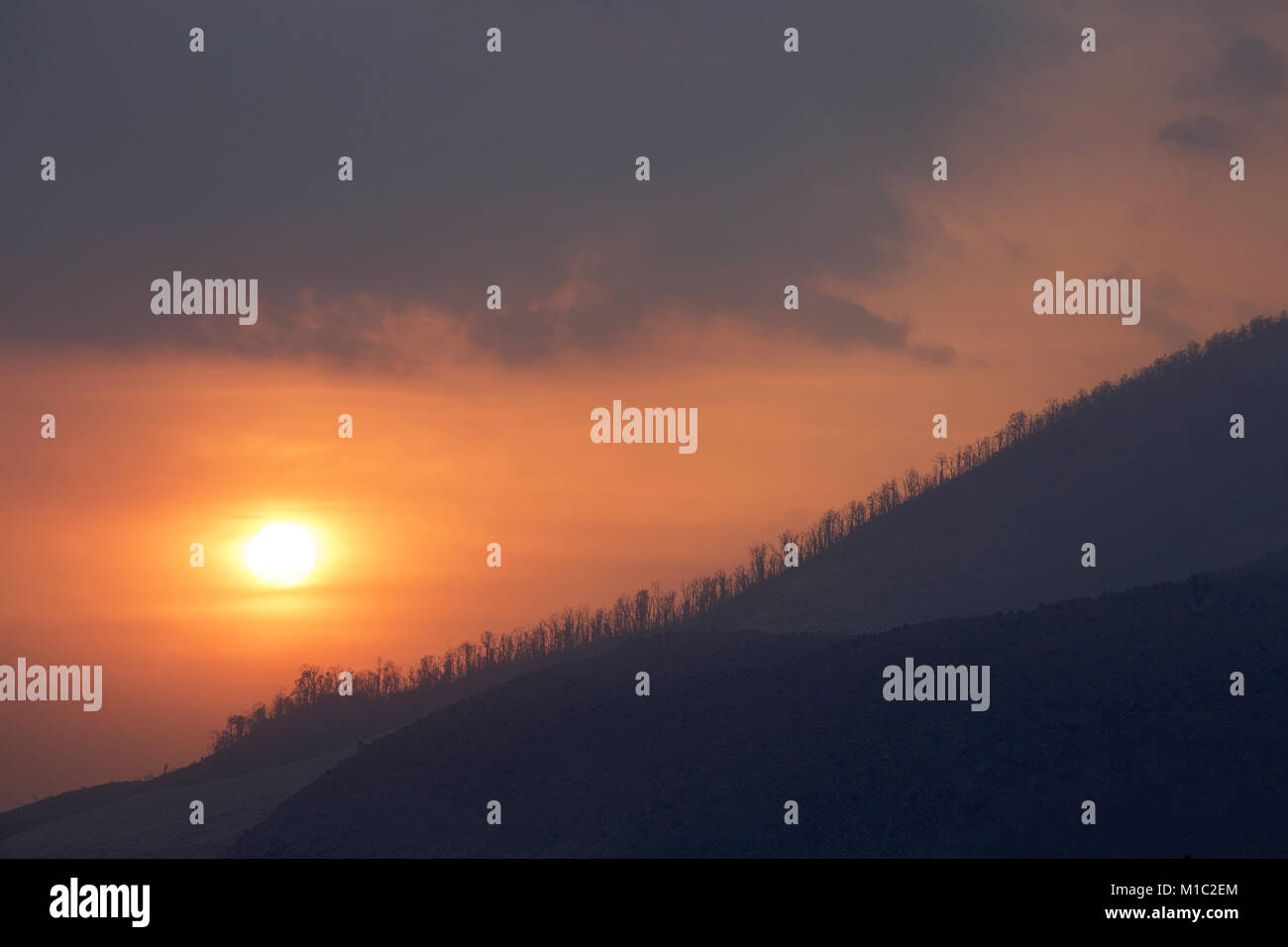 Colourful Sunset over Sinabung volcano in the Karo Highlands of North ...