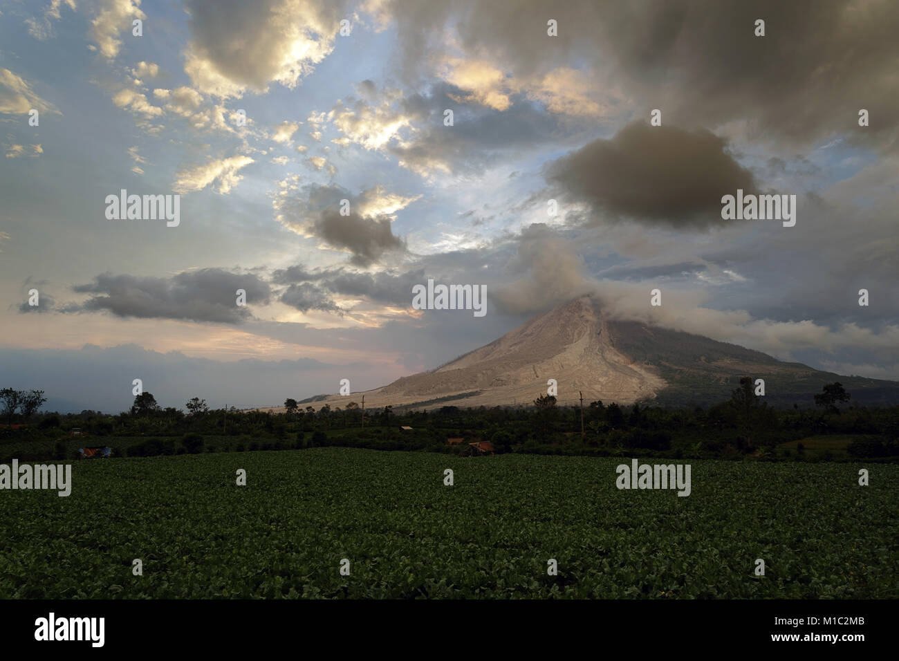 Colourful Sunset over Sinabung volcano in the Karo Highlands of North ...