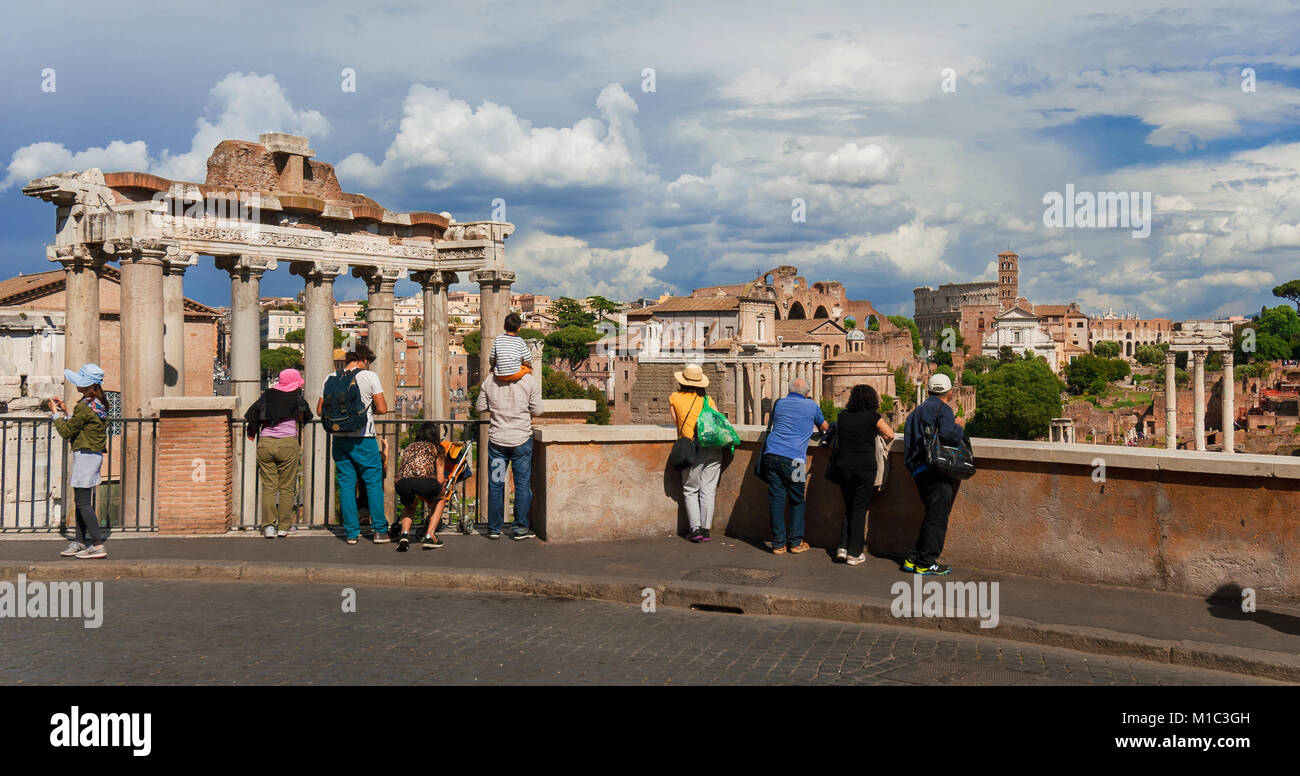 Tourists watch Roman Forum ancient ruins under beautiful clouds Stock ...