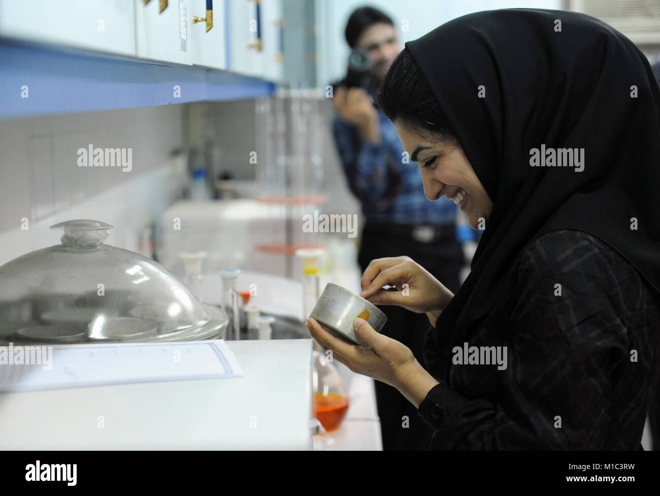 Iranian woman student in the laboratory at the Shahid Chamran ...