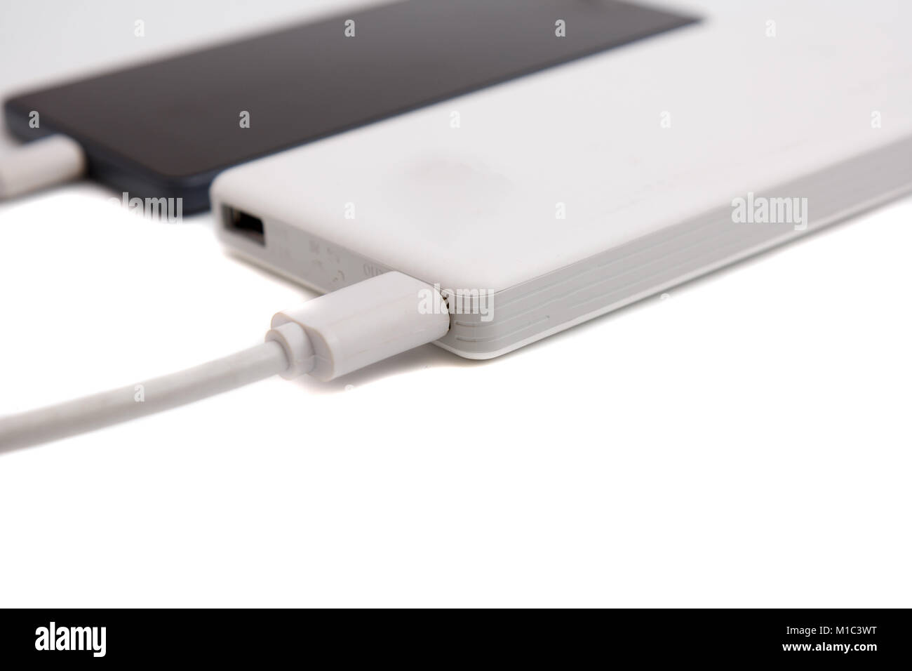 mobile phone charging Stock Photo - Alamy