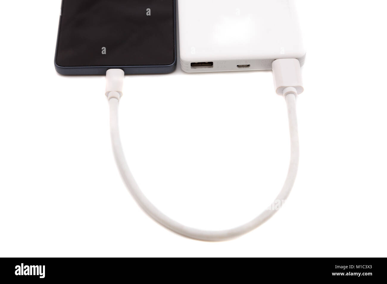 mobile phone charging Stock Photo - Alamy