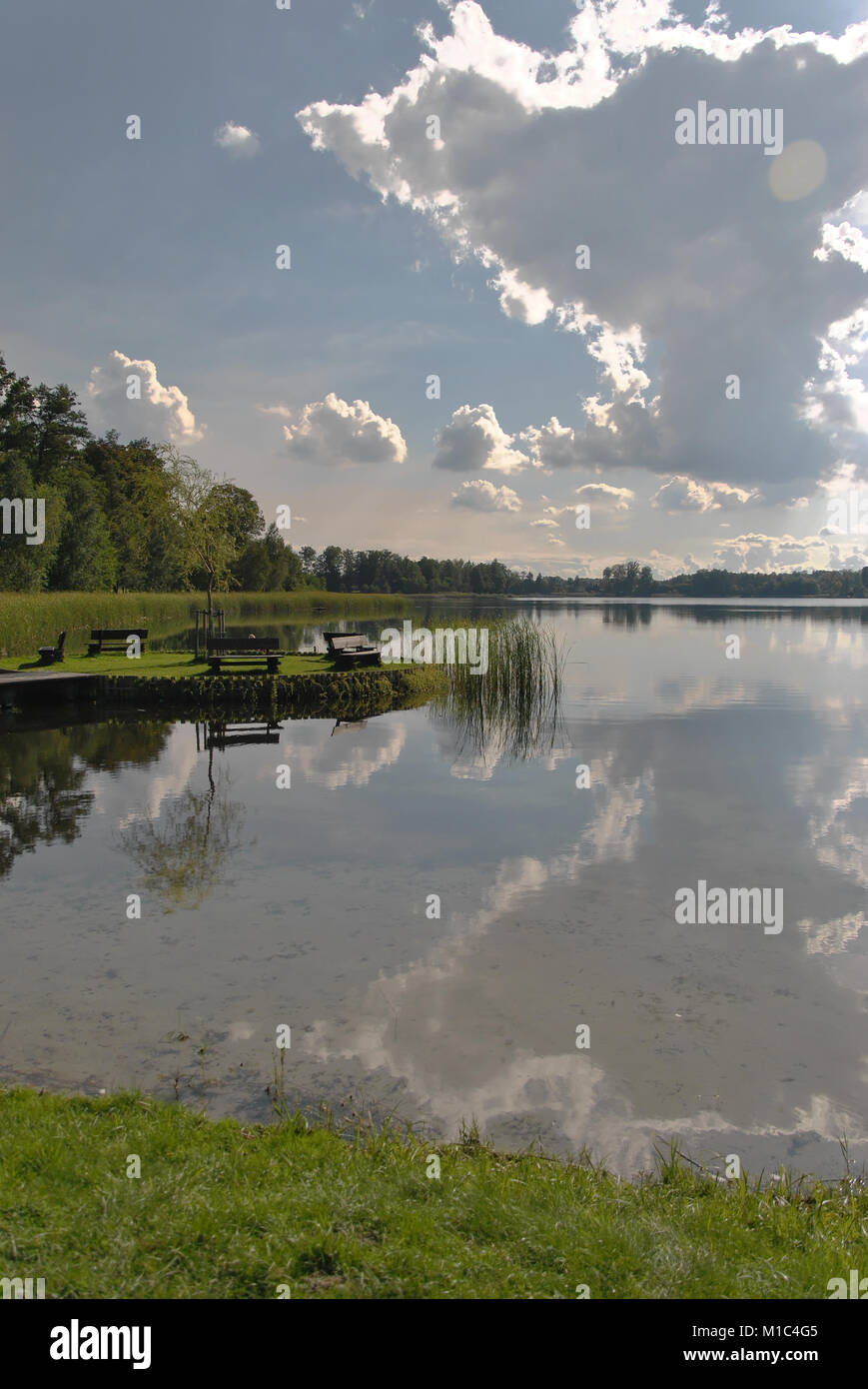 Lake view with clouds reflection Stock Photo - Alamy