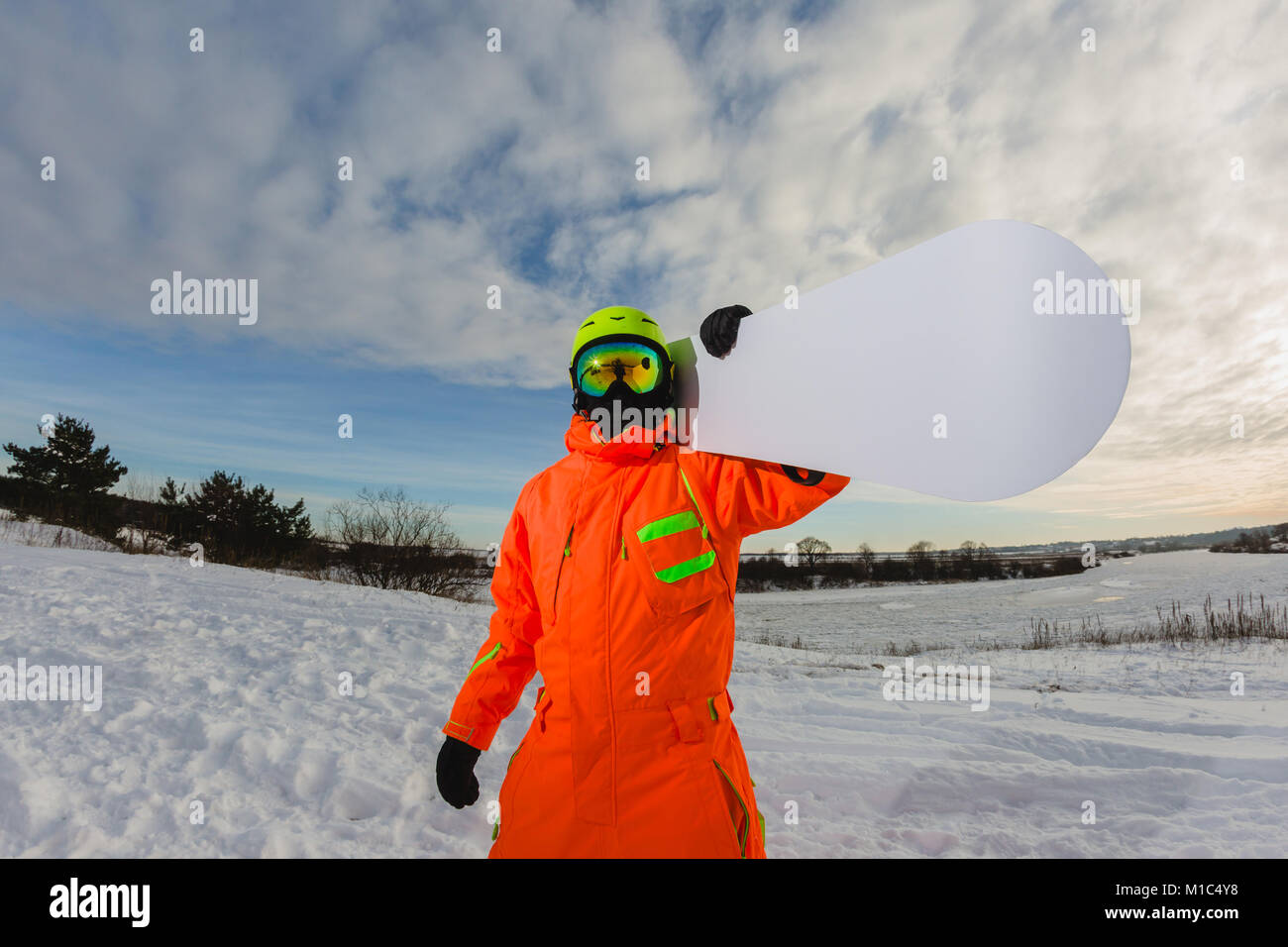 Bright orange snow suit hi-res stock photography and images - Alamy