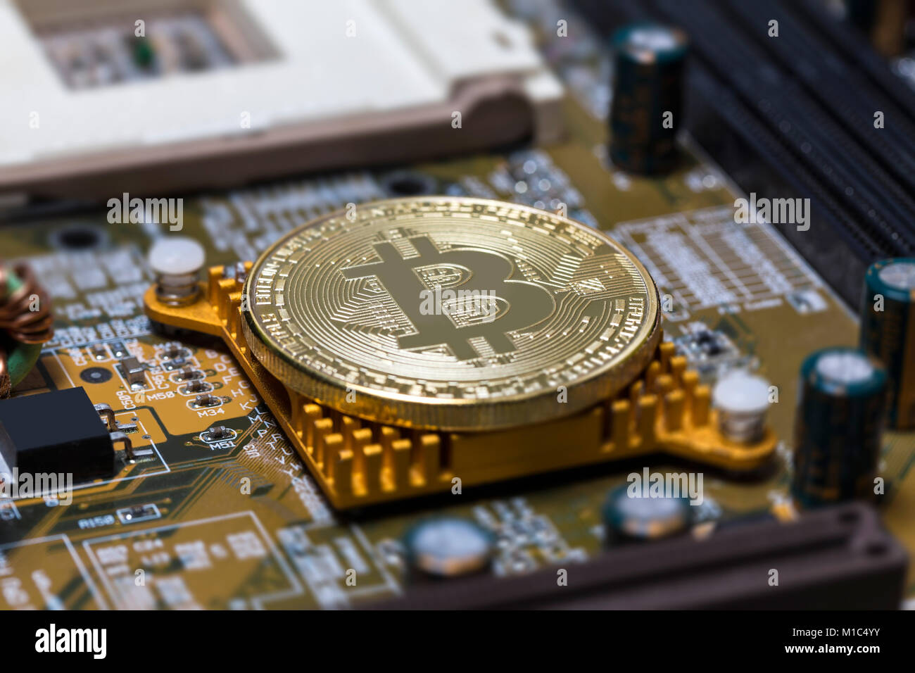 bitcoin on an computer motherboard Stock Photo - Alamy