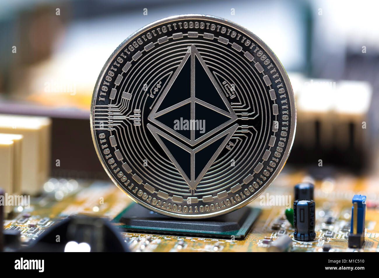 ethereum coin on an computer motherboard Stock Photo - Alamy