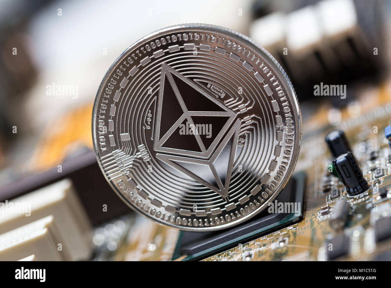 ethereum coin on an computer motherboard Stock Photo - Alamy