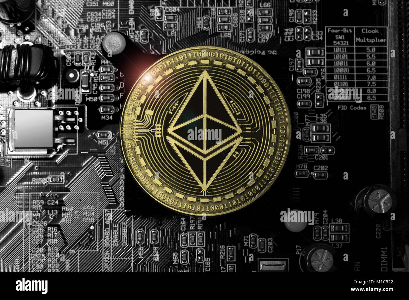 ethereum coin on an computer motherboard golden style Stock Photo - Alamy