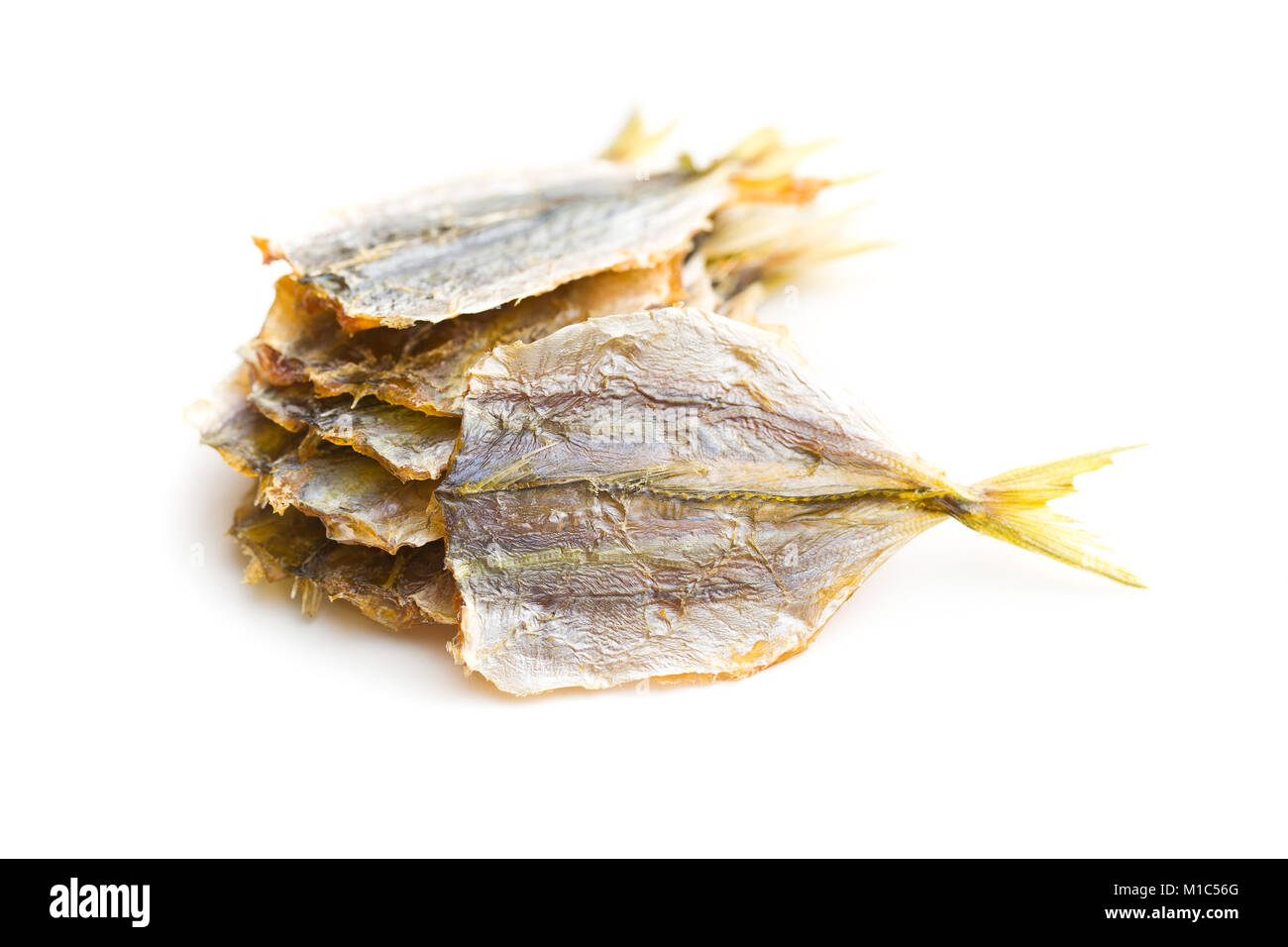 Dried salted fish isolated on white background Stock Photo - Alamy
