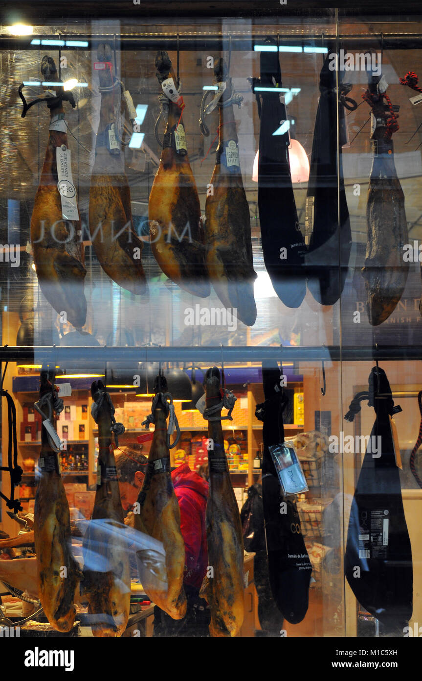 Processed Spanish meats for sale at a butchers stall selling ...
