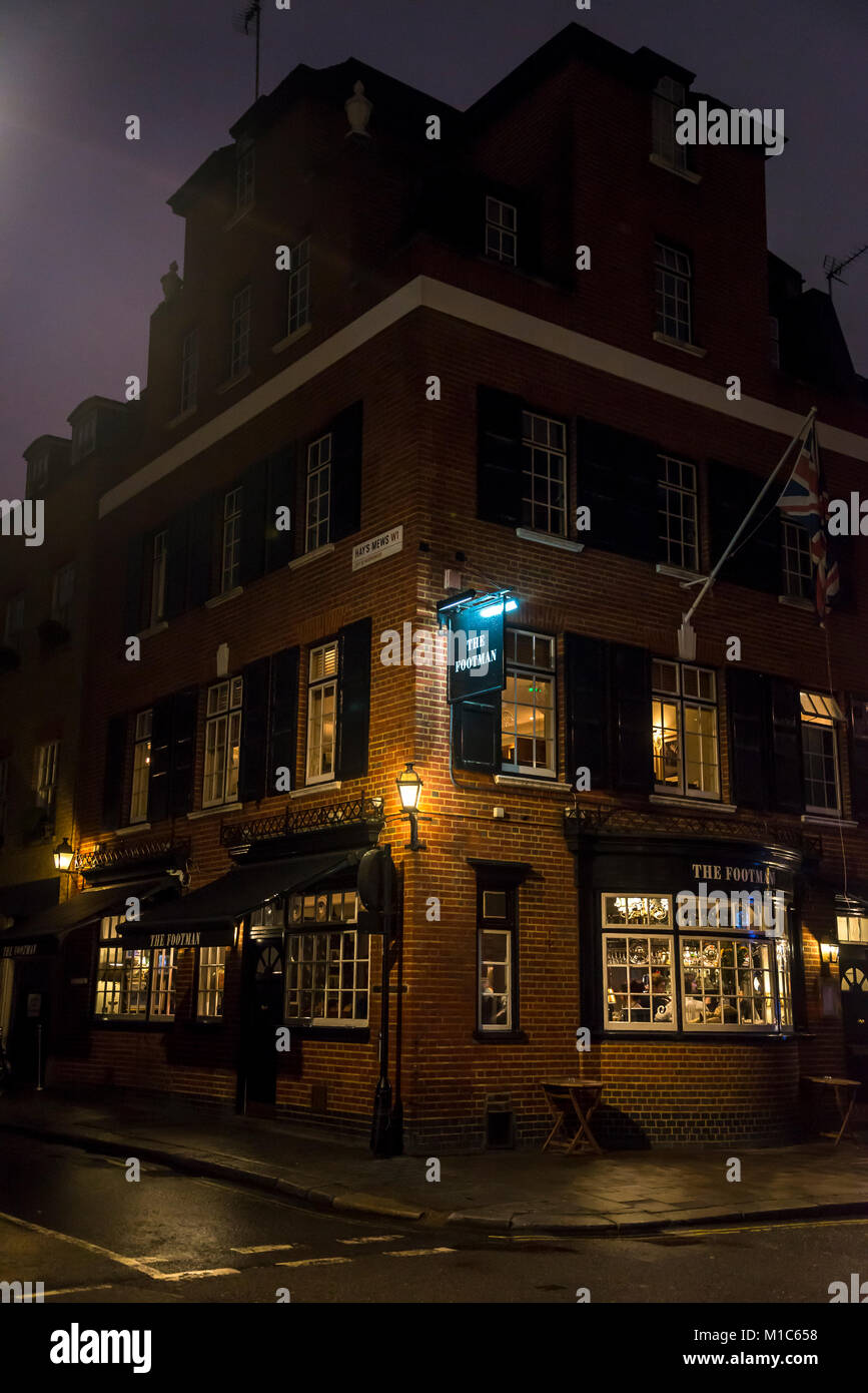 The Footman pub at night, Mayfair, London, England, UK Stock Photo - Alamy
