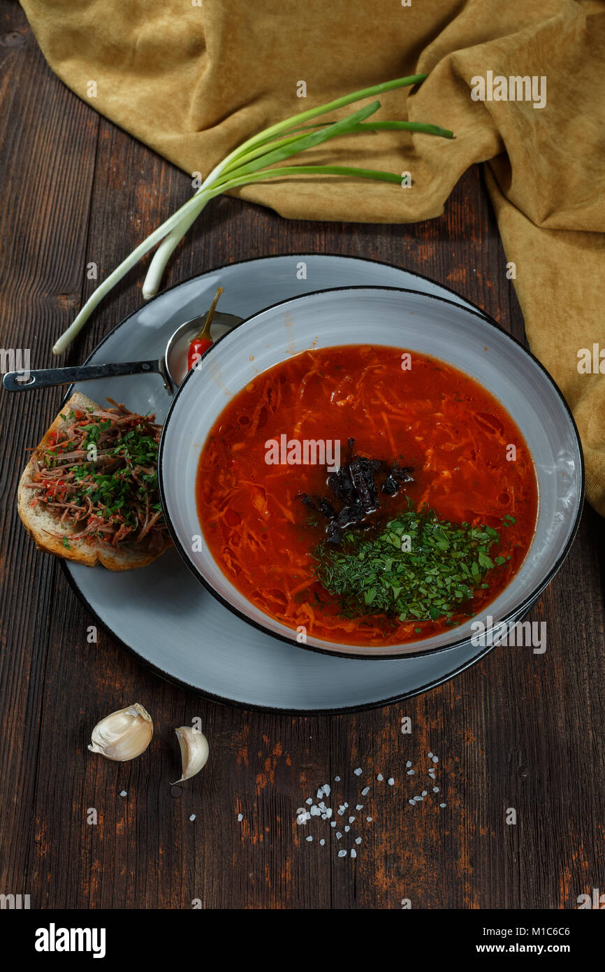 Traditional Ukrainian Russian borscht with white beans on the bowl ...