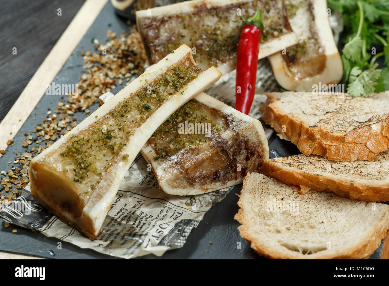 beef bone marrow with chimichurri sauce and french onion Stock Photo ...